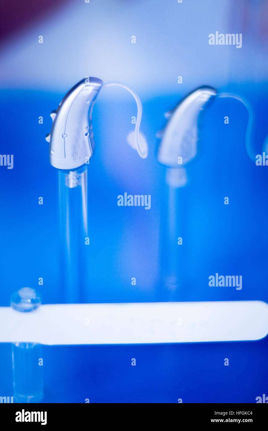 Modern high technology digital hearing aids in retail store shop window ...