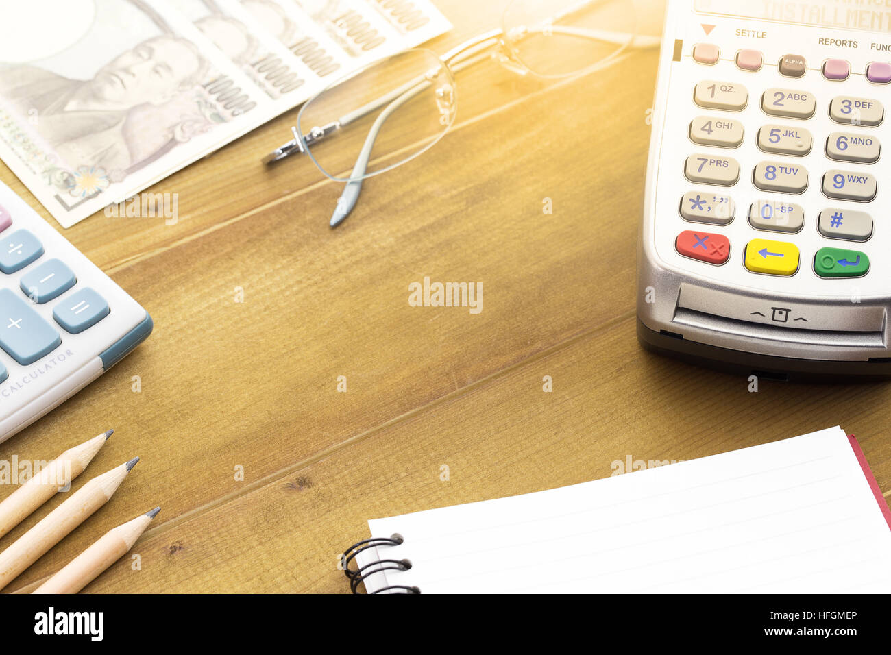 Credit Card Terminal or EDC on cashier wooden table in the store with ...