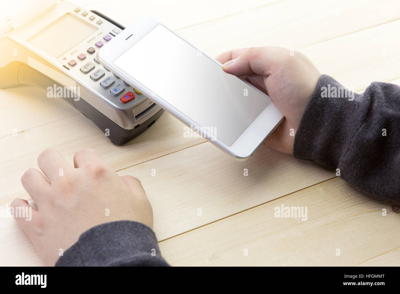 Mobile payments. Male hands using smart phone concept to made payment ...