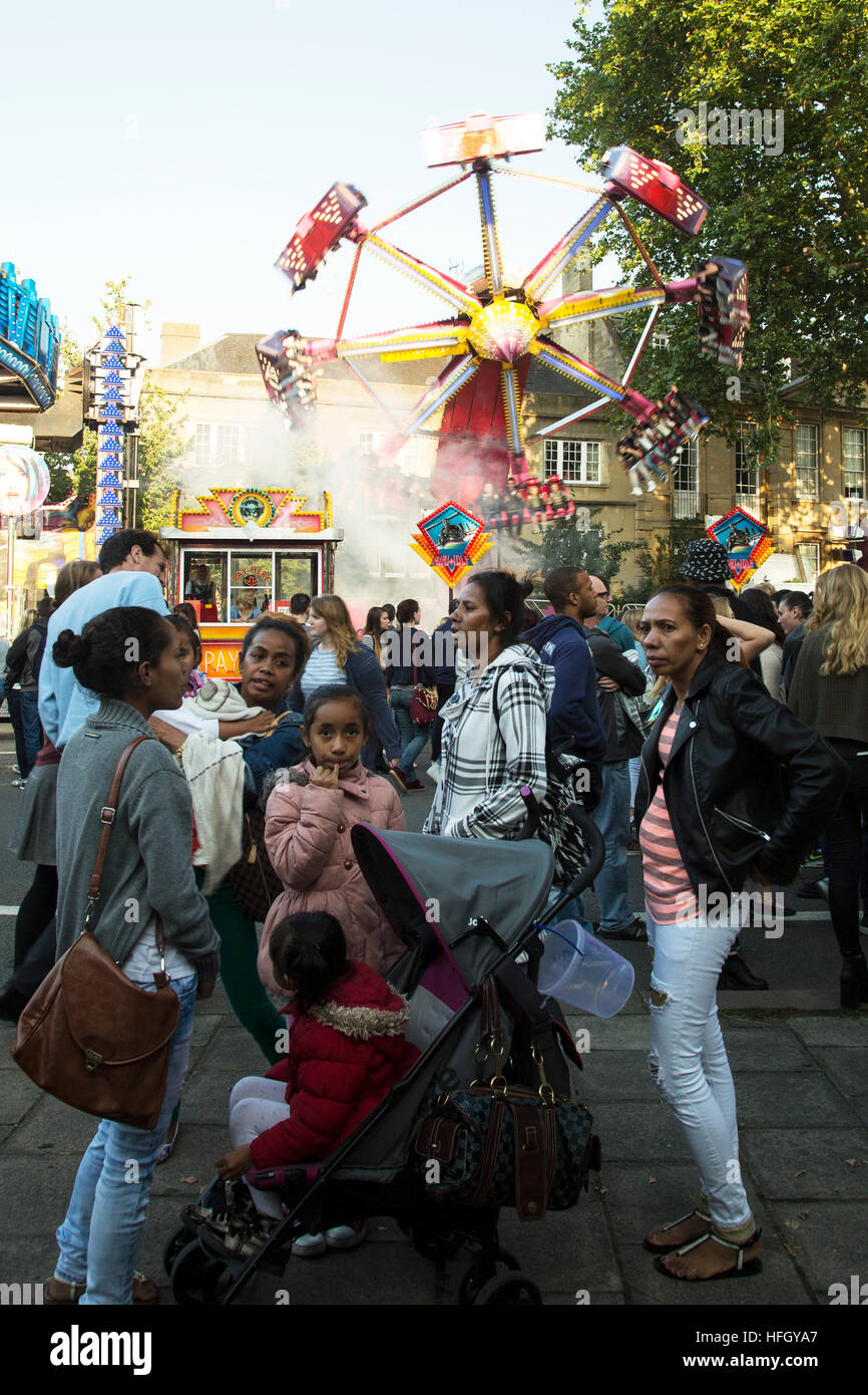 Family on fairground ride hi-res stock photography and images - Alamy