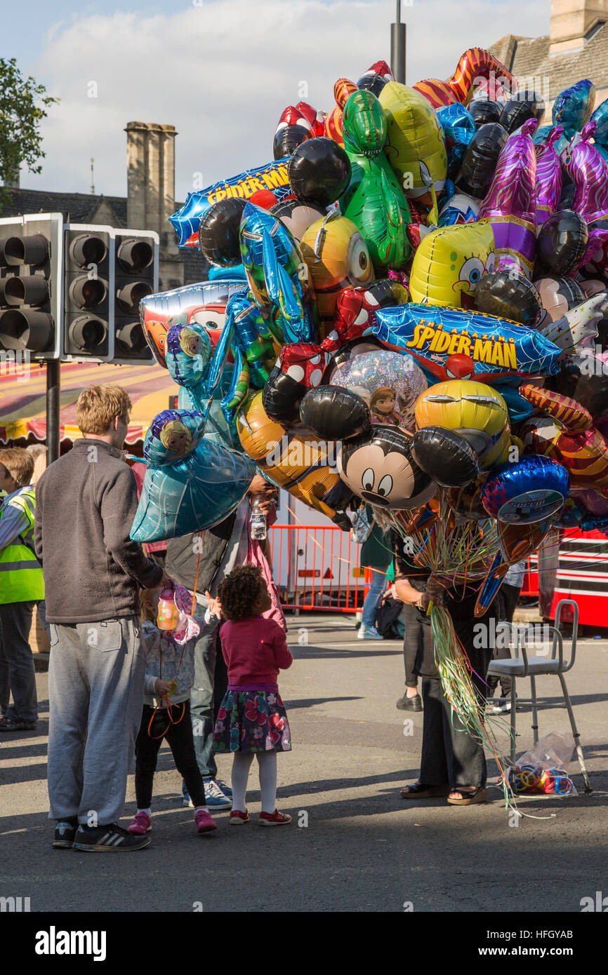 Father and daughter enjoy a ride at St Giles Fair, Oxford Stock Photo ...
