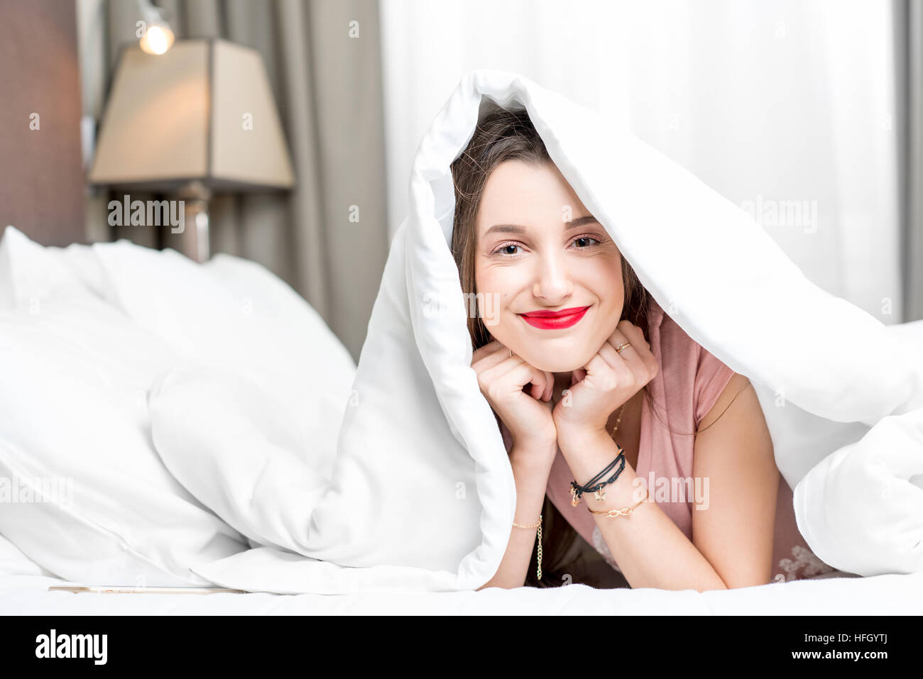 Hiding under sheets hi-res stock photography and images - Alamy