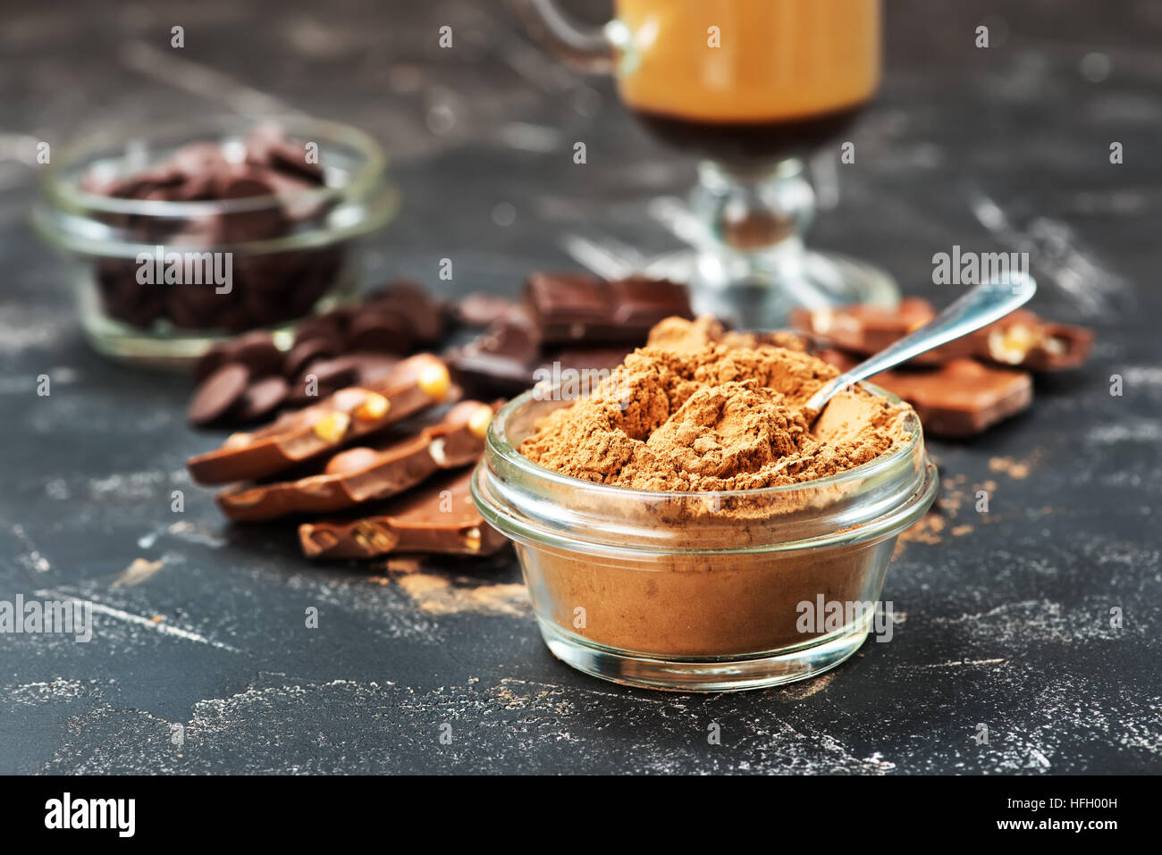 chocolate and cocoa powder on a table Stock Photo - Alamy