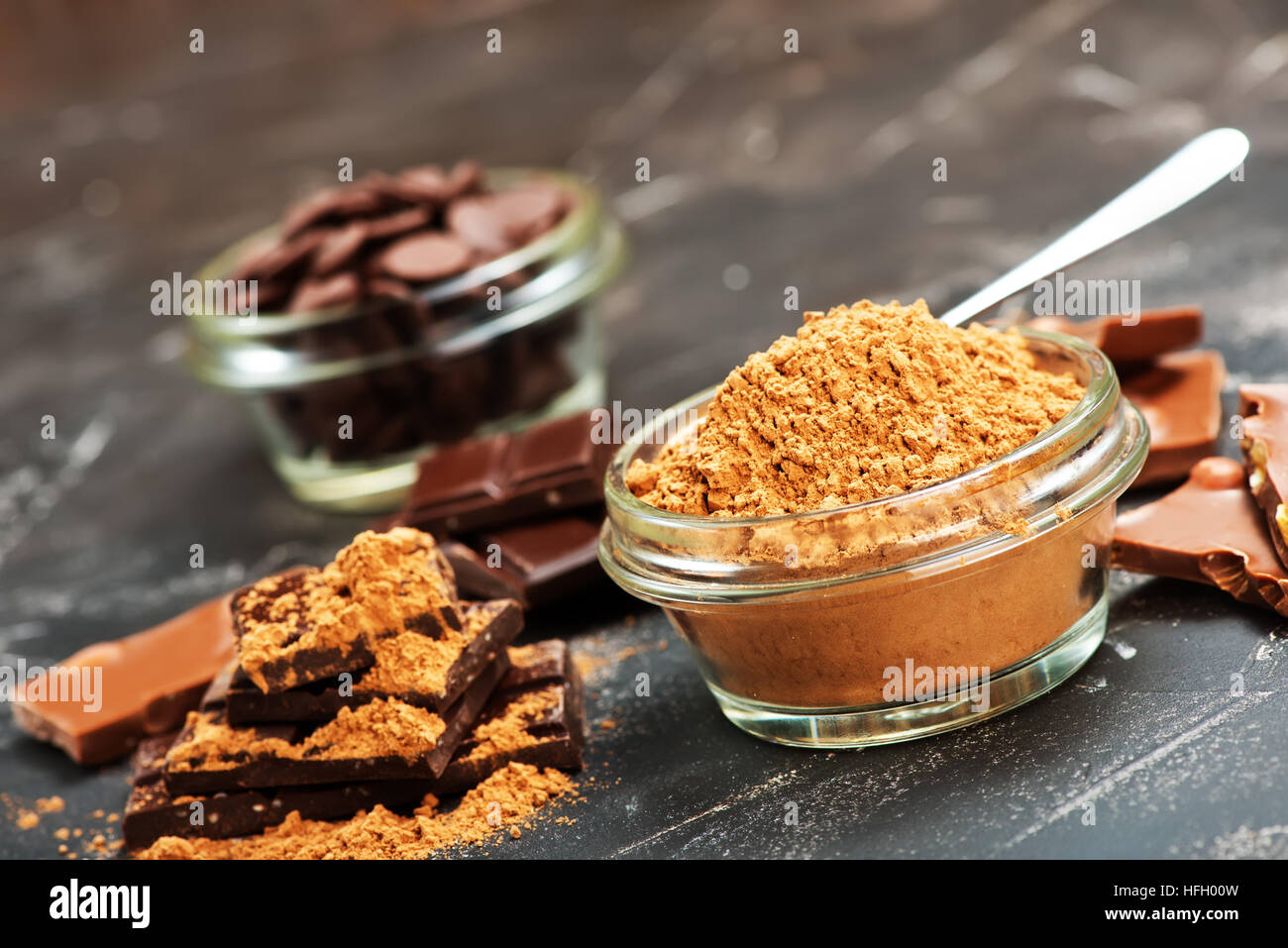 chocolate and cocoa powder on a table Stock Photo - Alamy