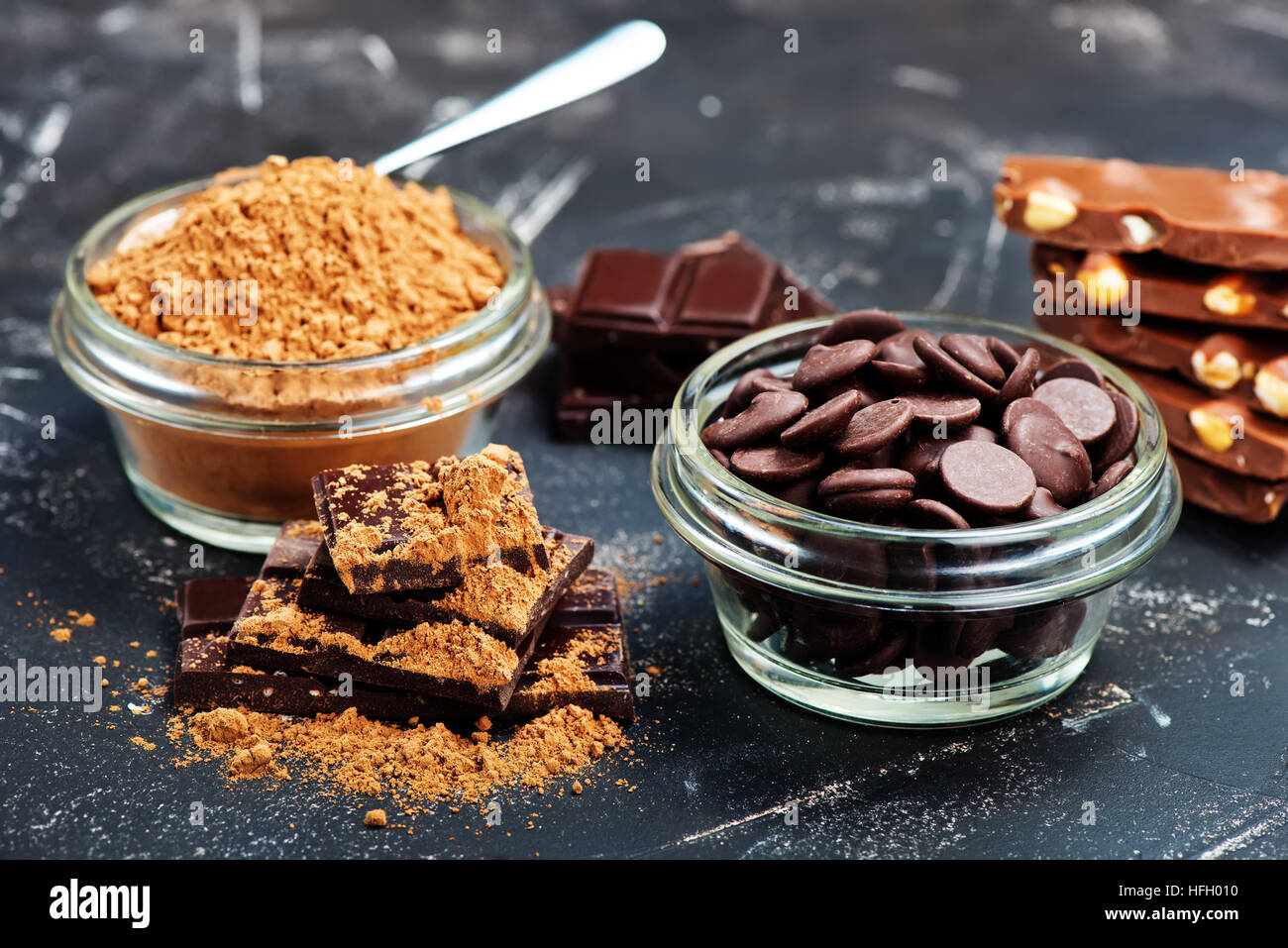 chocolate and cocoa powder on a table Stock Photo - Alamy