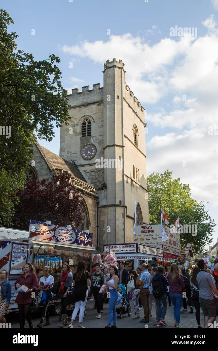 St Giles Fair in Oxford with people walking past stall selling a wide ...