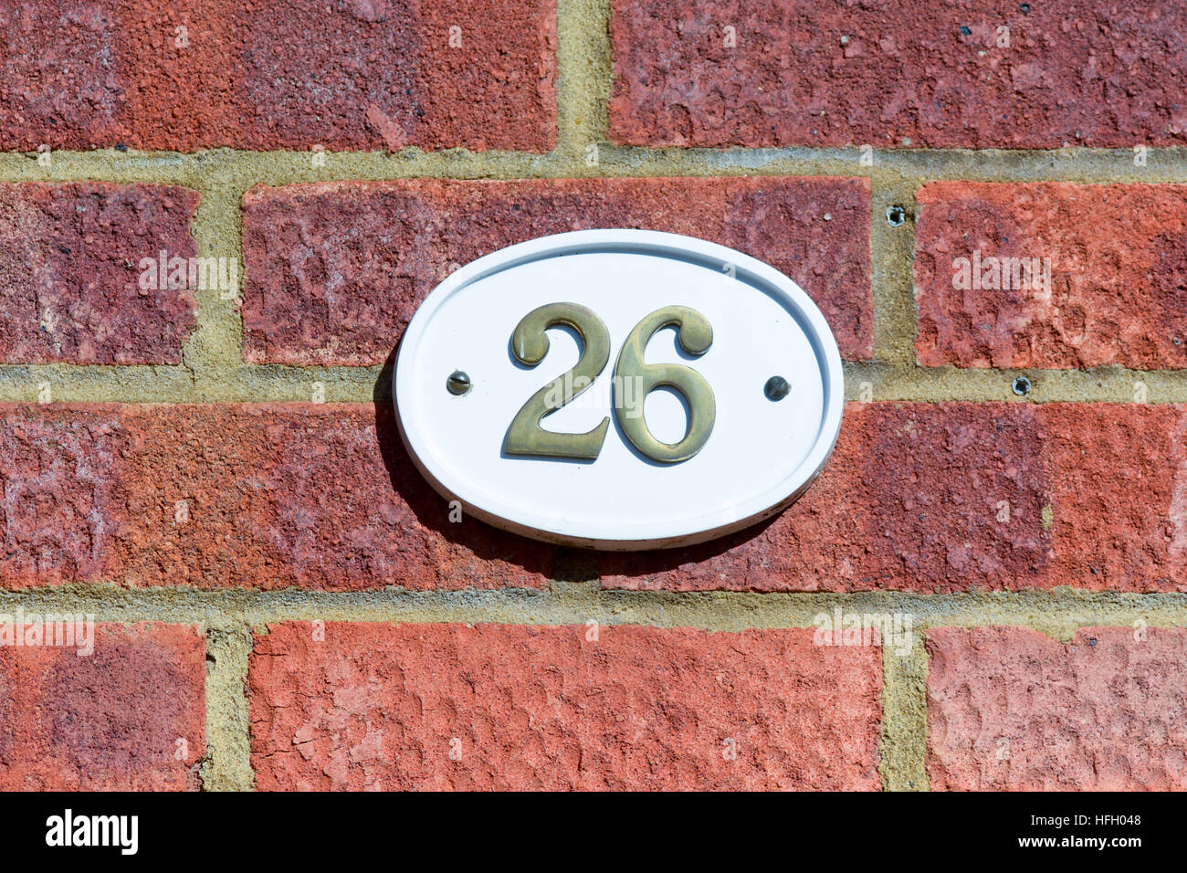 House Number 26 sign on wall Stock Photo - Alamy