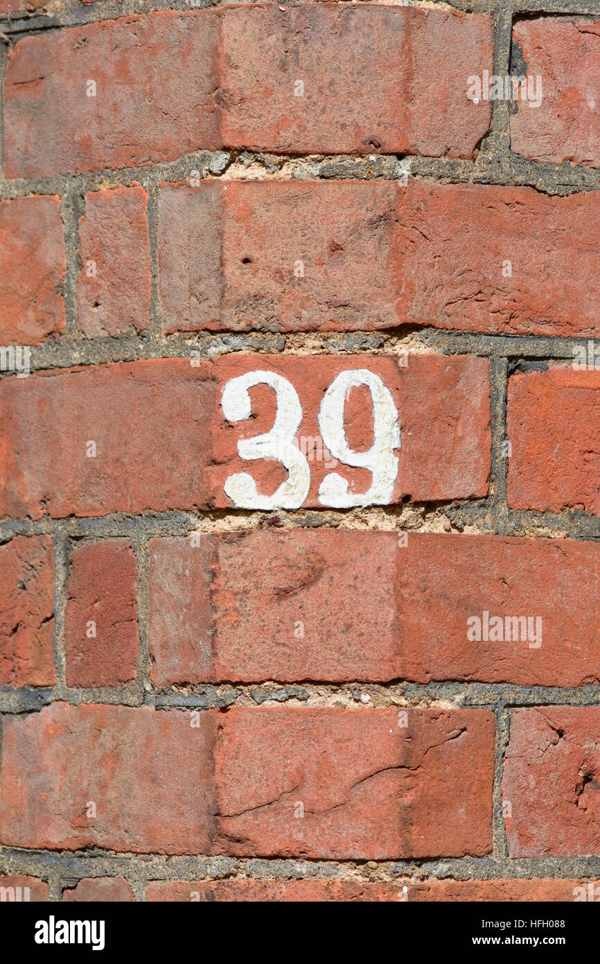 House Number 39 painted sign on wall Stock Photo - Alamy