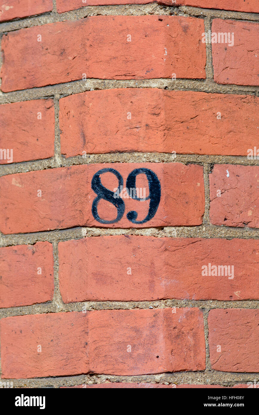 House Number 89 painted sign on wall Stock Photo - Alamy