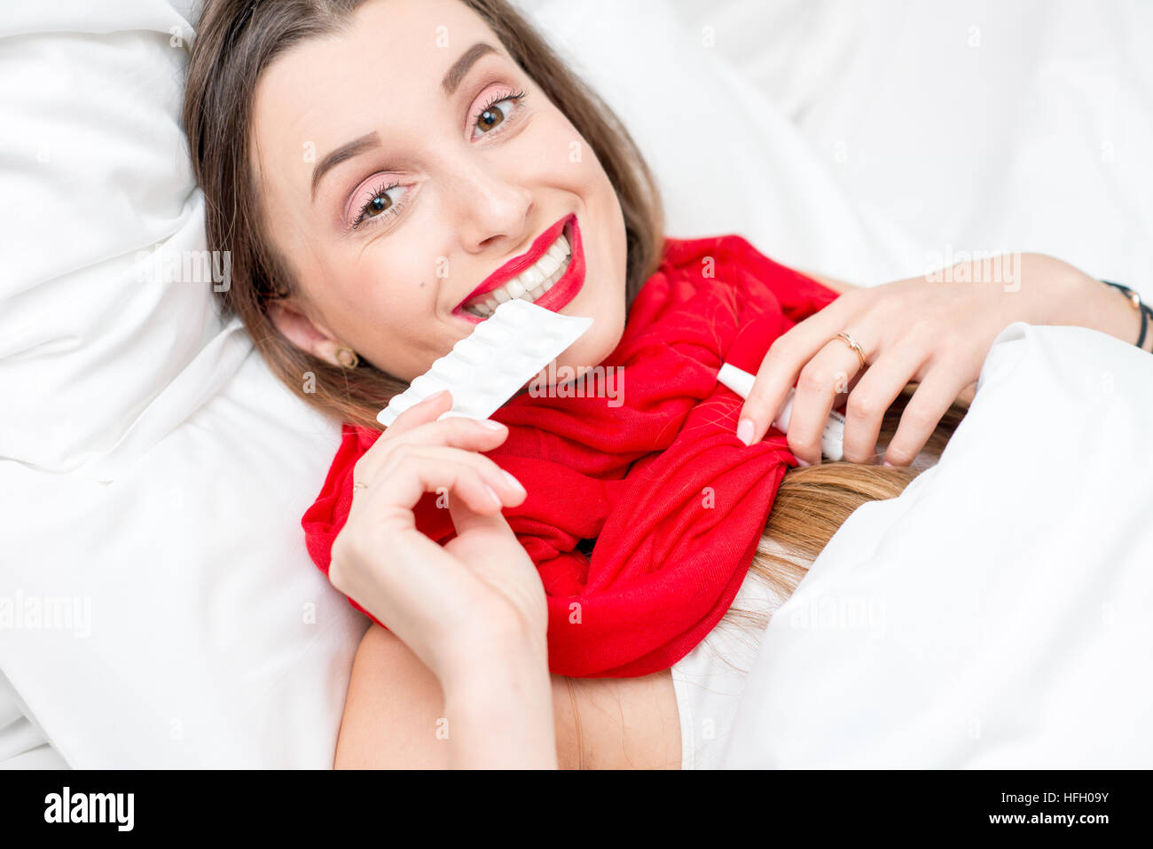 Sick woman in bed Stock Photo - Alamy