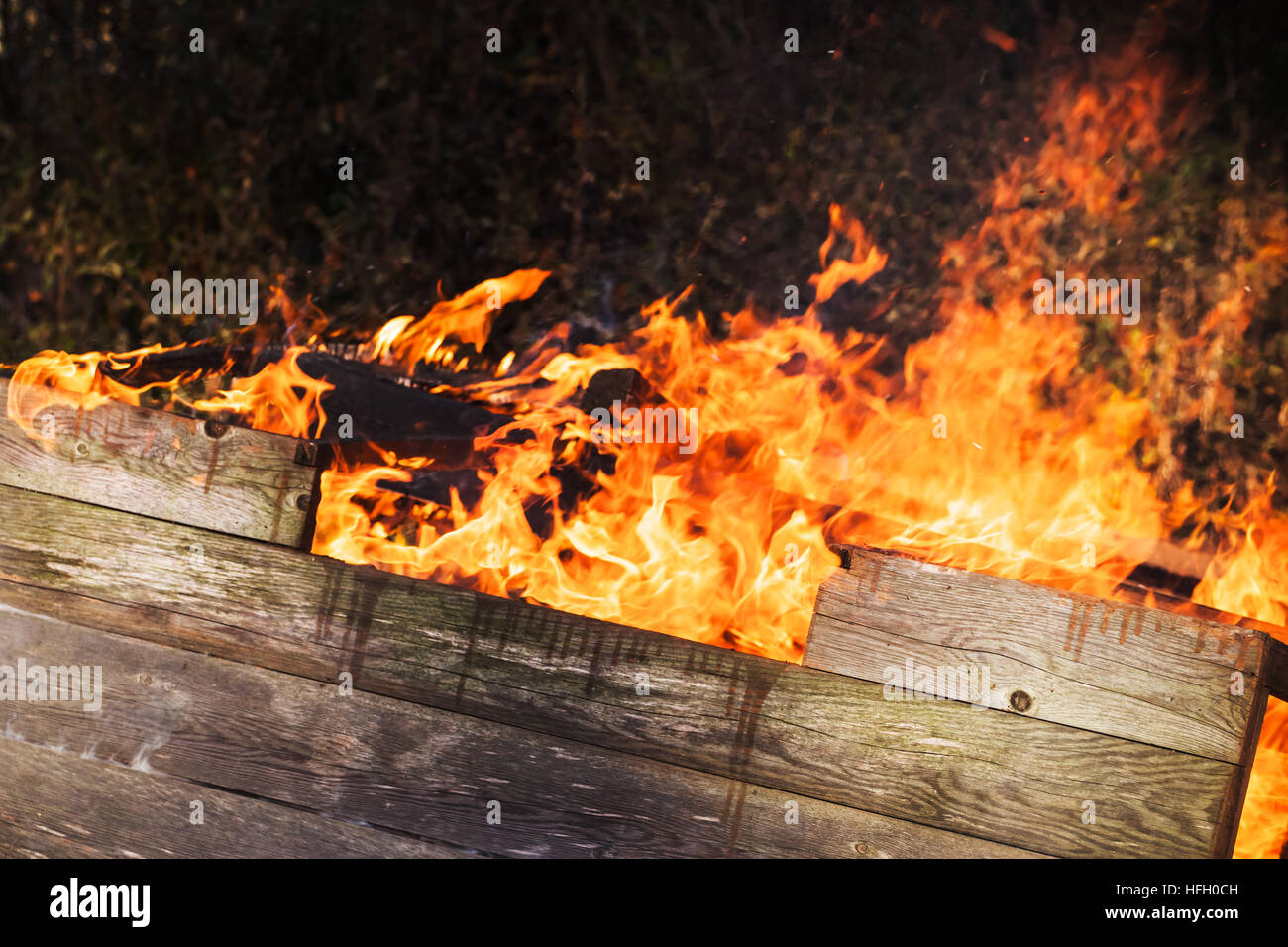 Closeup photo of burning wooden boxes in big bonfire Stock Photo - Alamy