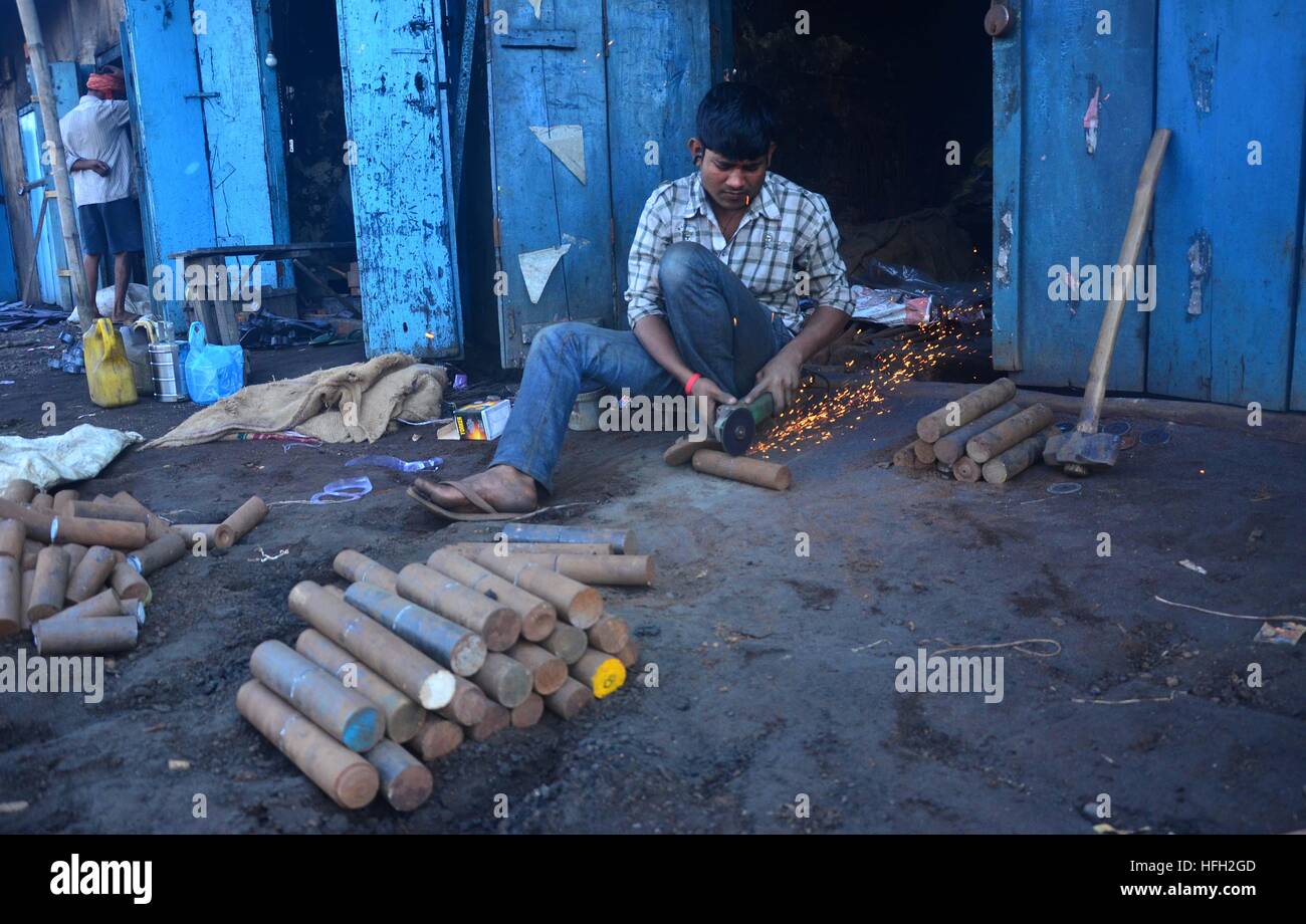 Dimapur, India. 31st December 2016: An Indian blacksmith works at his ...