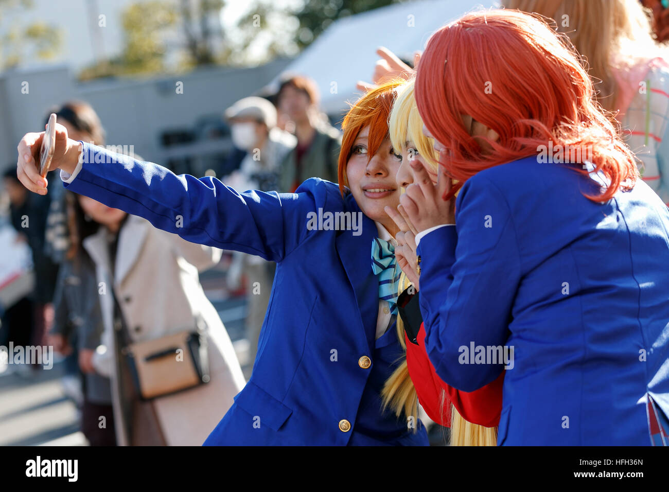Tokyo, Japan. 31st Dec, 2016. Cosplayers pose for a selfie during the ...