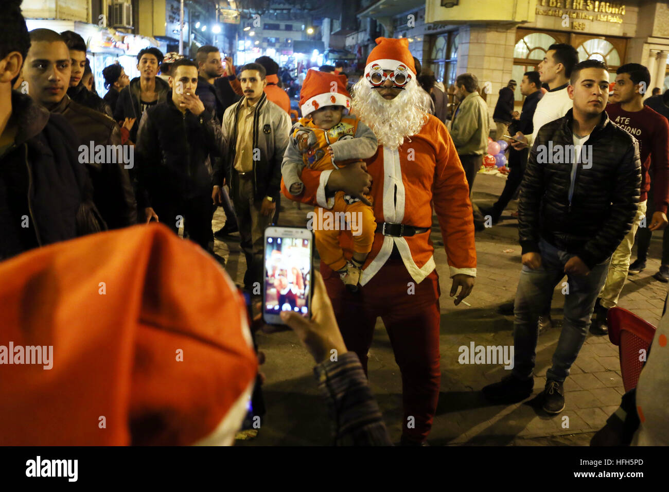 Cairo, Egypt. 31st Dec, 2016. People celebrate New Year in downtown ...