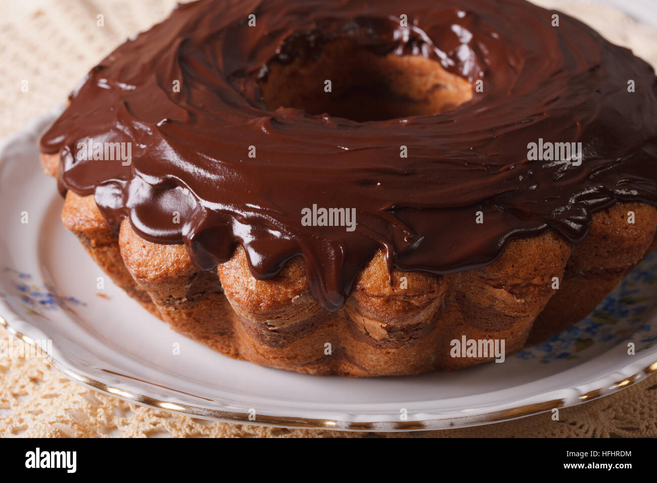 Homemade chocolate cake fancy bread on a plate closeup. Horizontal ...