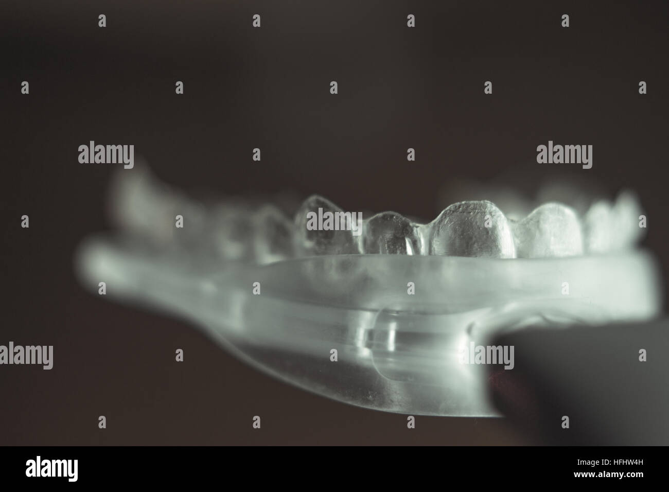 Vibrating dental device with invisible orthodontics Stock Photo - Alamy