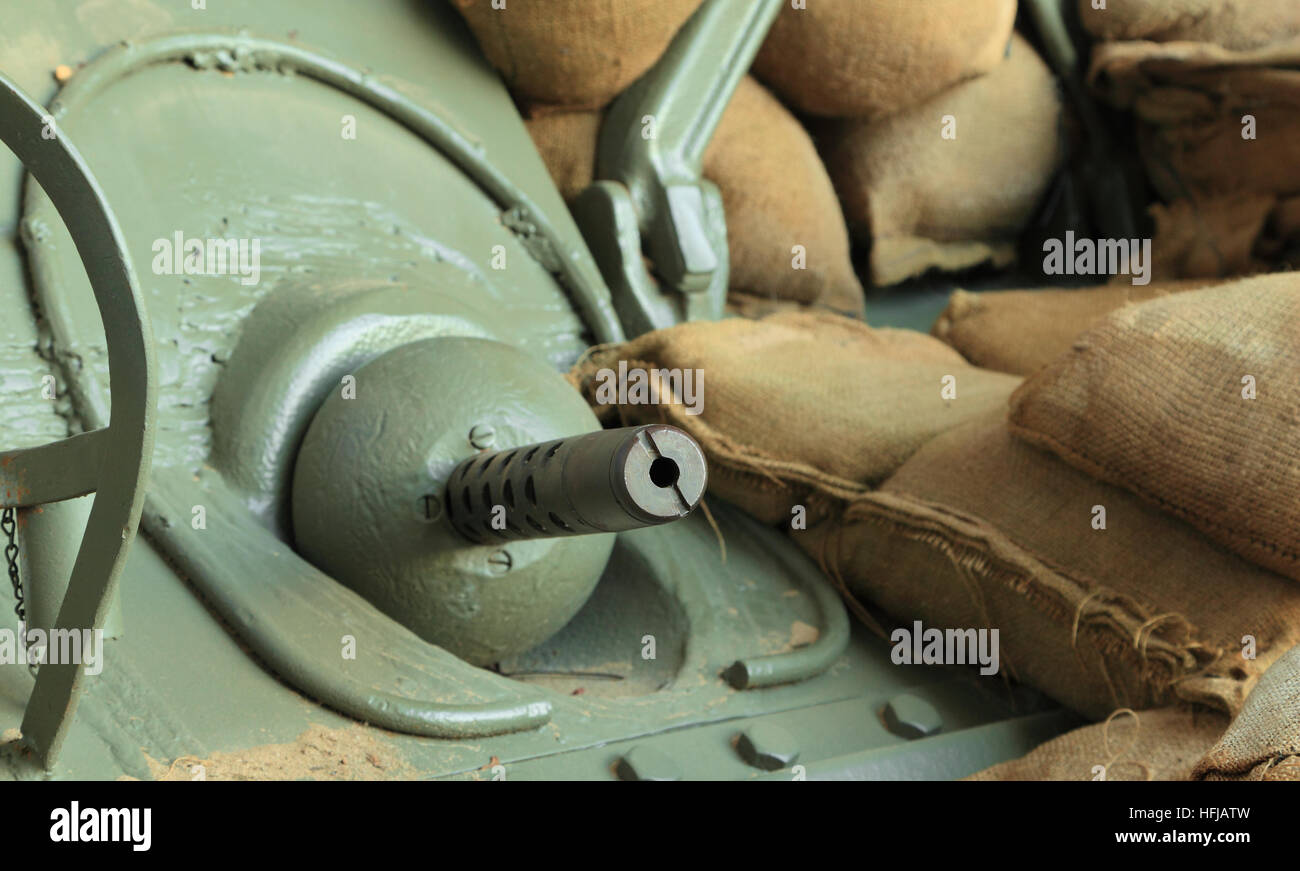 Close-up of the barrel of a machine gun mounted on the front of a ...