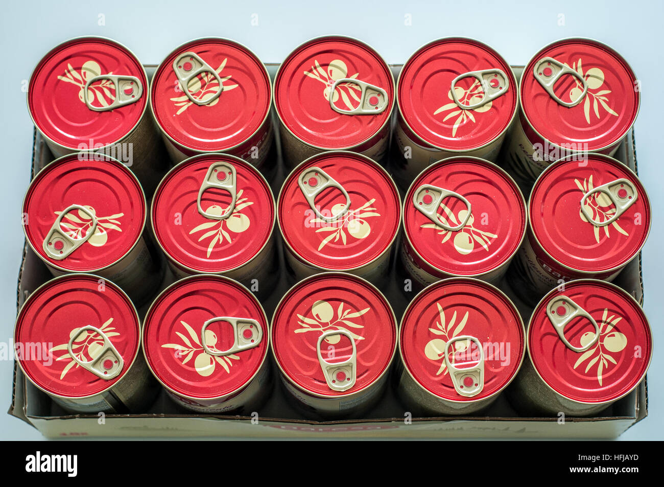 Canned olives in a red can Stock Photo - Alamy