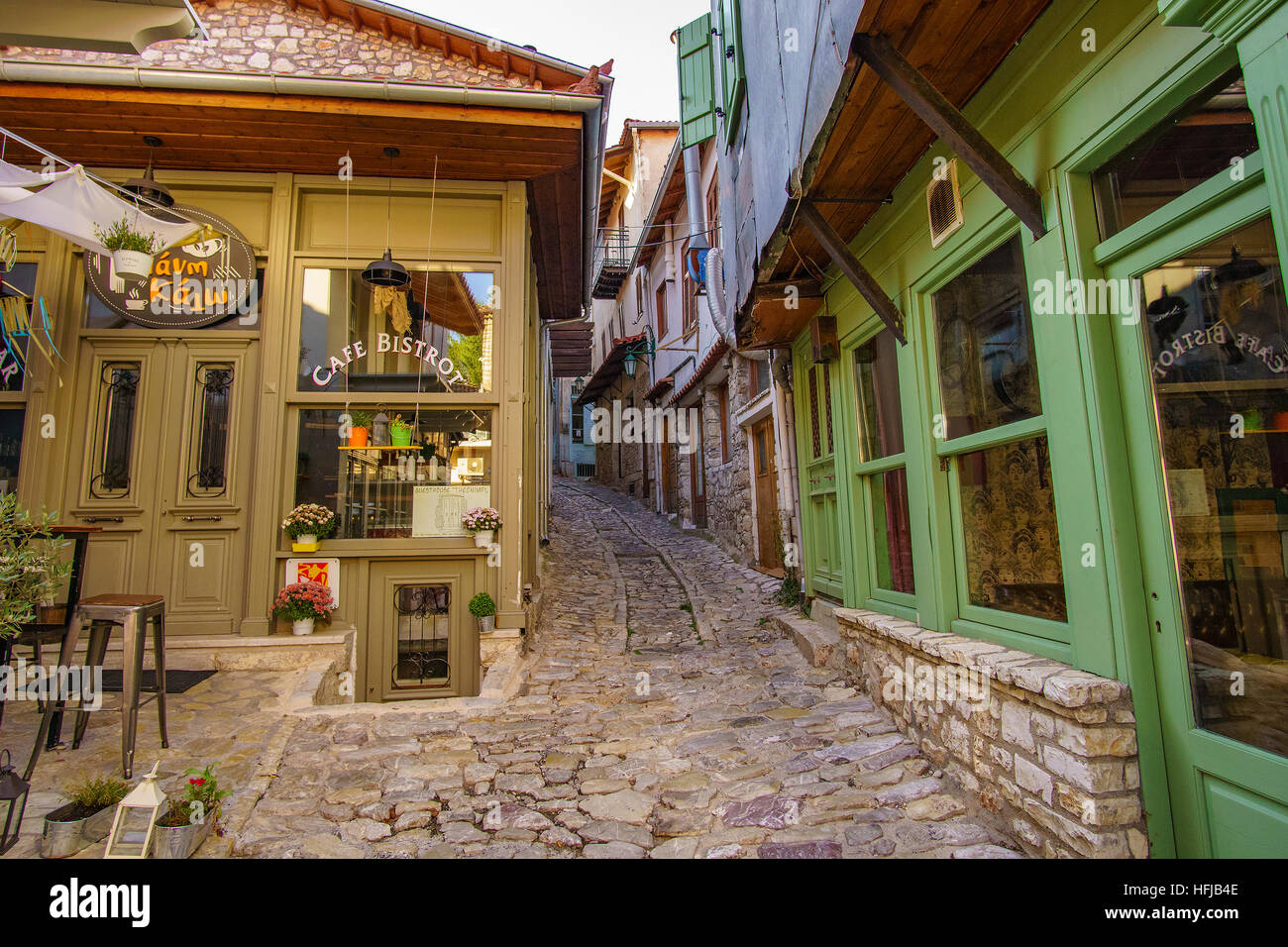 Traditional houses of Dimitsana village against a cloudy sky. Arcadia ...