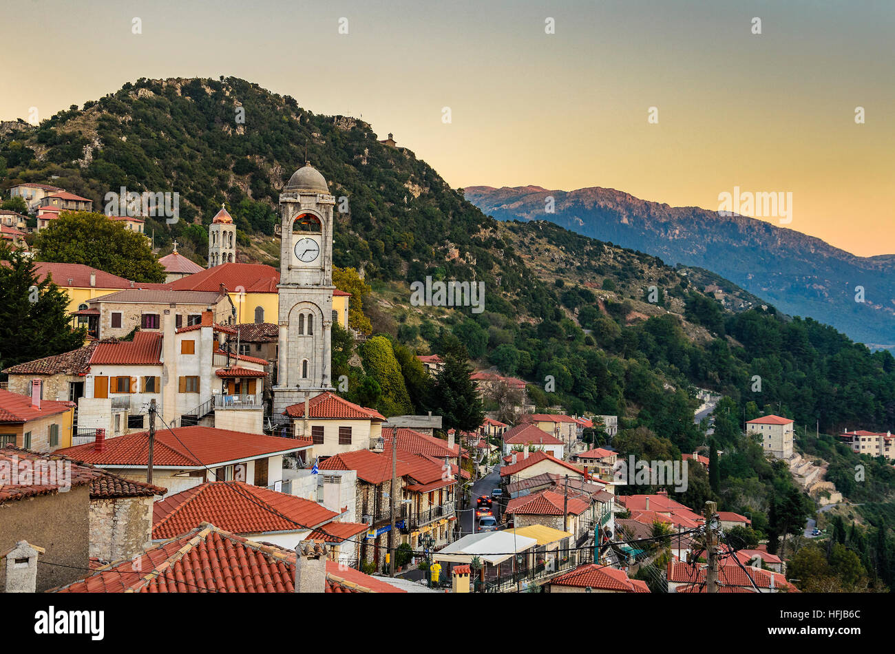Traditional houses of Dimitsana village against a cloudy sky. Arcadia ...