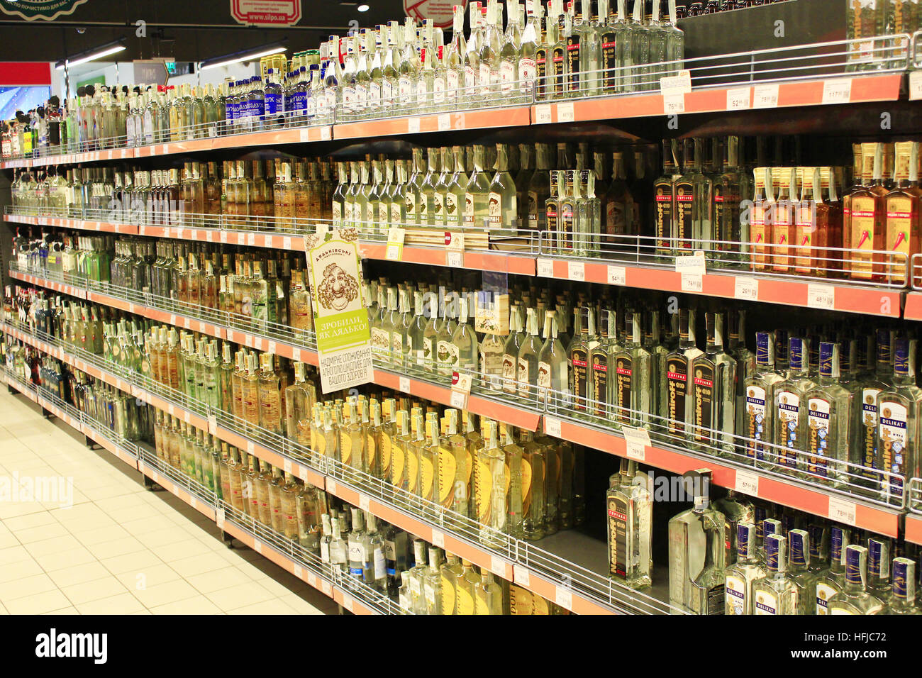store of strong alcoholic drinks like vodka on the shelves of ...