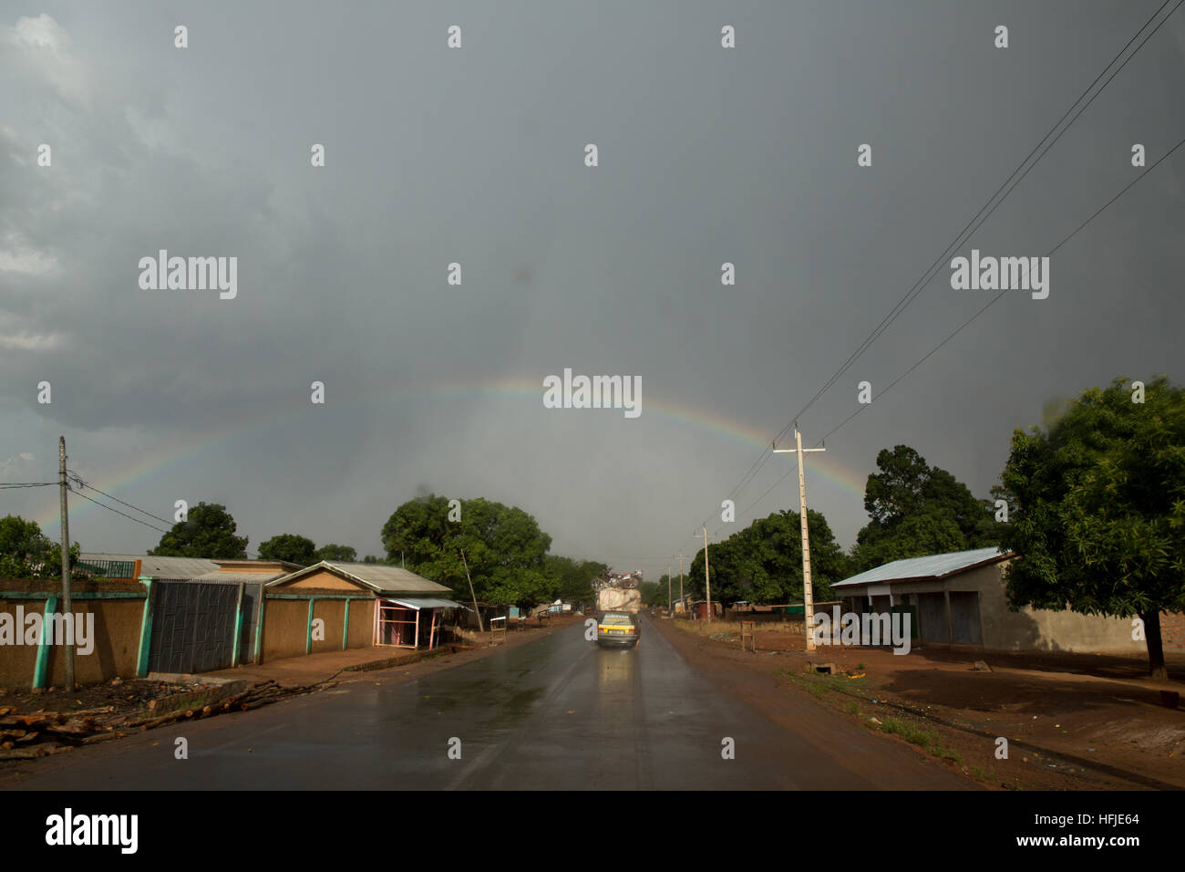 Kankan, Guinea, 1st May 2015: a rainbow appears in the sky after early ...