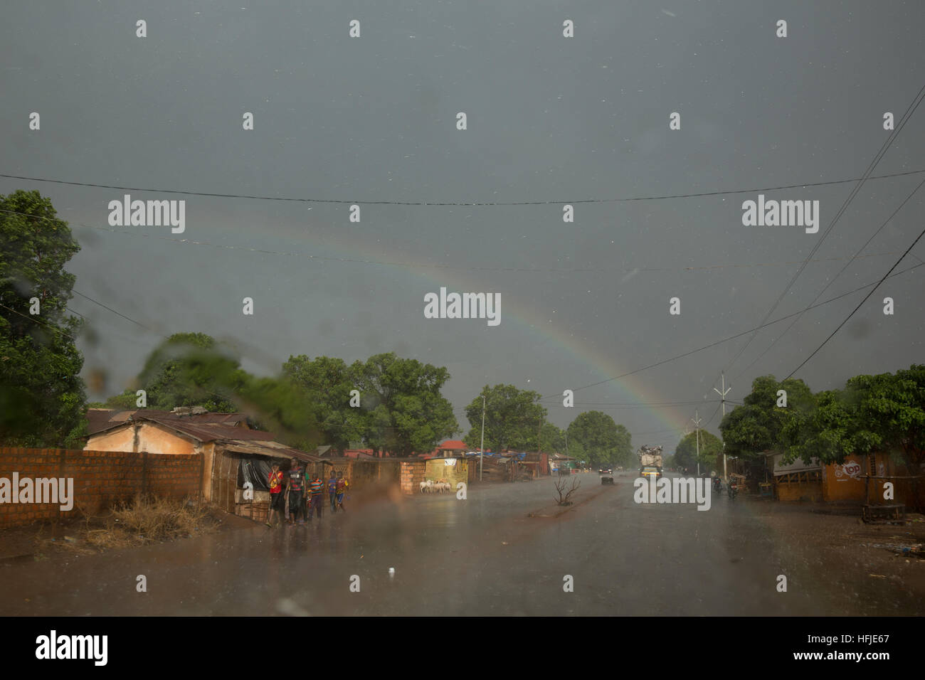 Kankan, Guinea, 1st May 2015: a rainbow appears in the sky after early ...