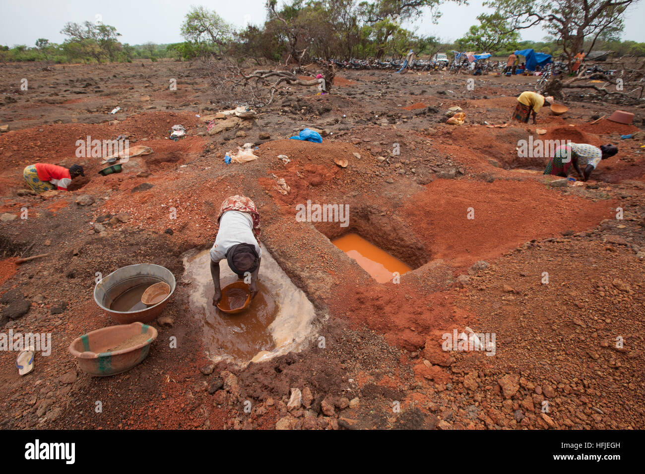 Sanana mine, Guinea, 2nd May 2015; Mariam Conde, mother of 6, collects ...