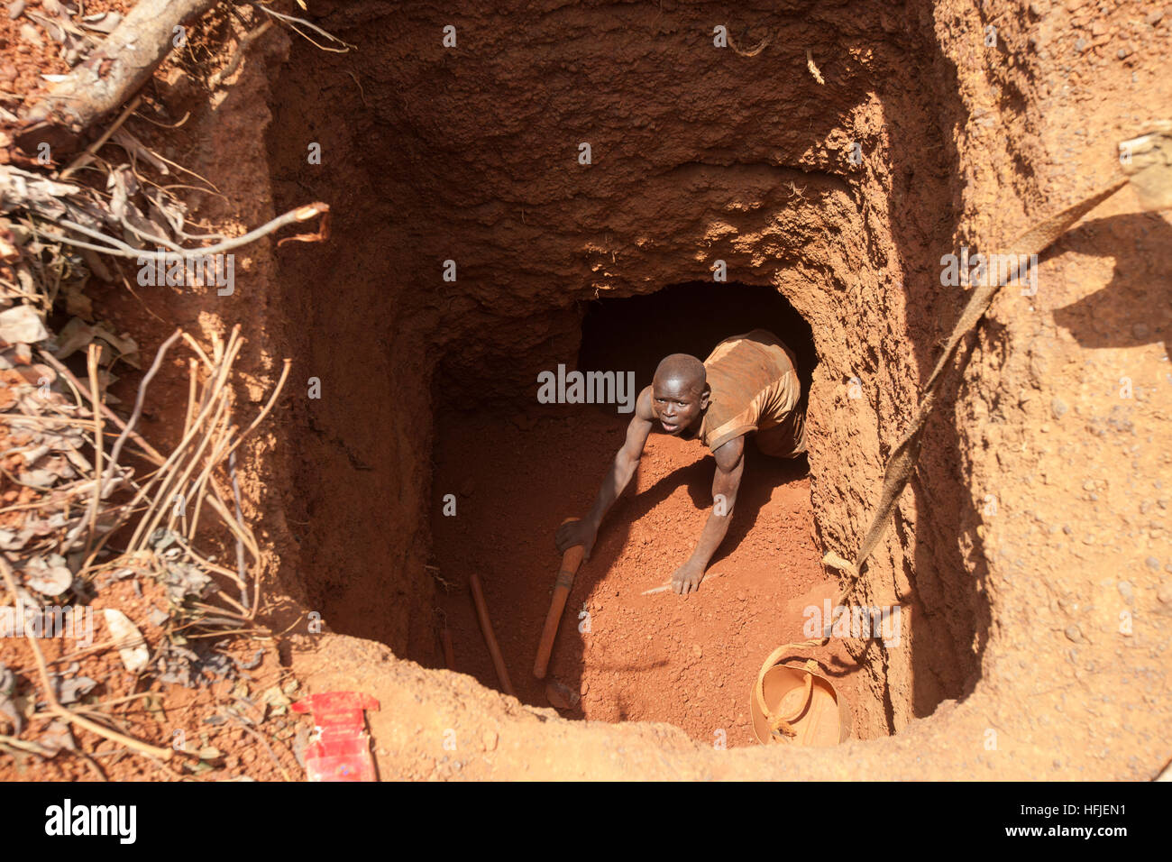Sanana mine, Guinea, 2nd May 2015; Mamady Conde, 11, entering Famoroba ...