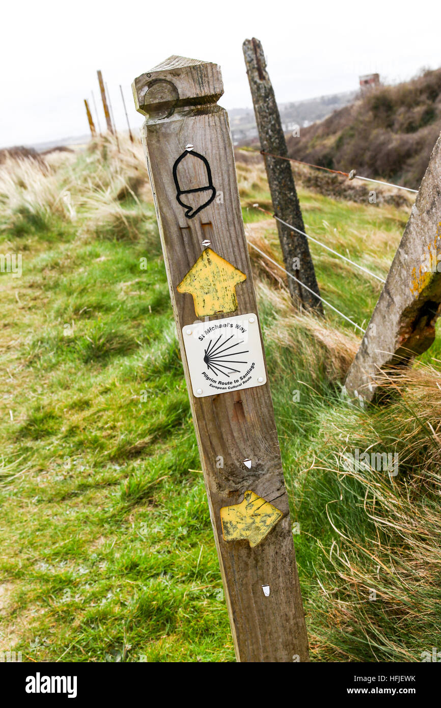 A wooden footpath sign post for St Michael's Way pilgrim route near St ...