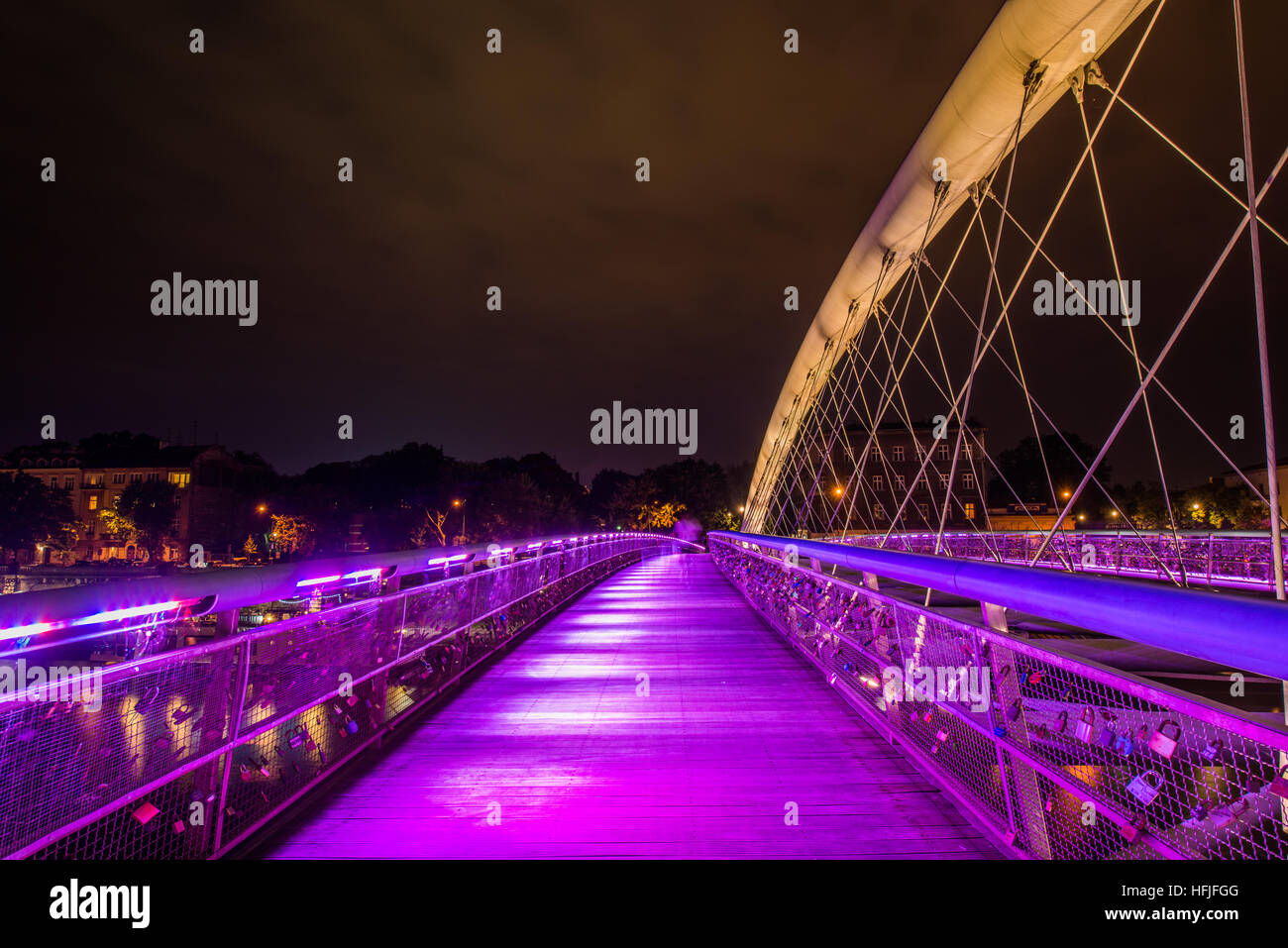 Evening shots of the bridge Kładka Ojca Bernatka over the Wisla river ...