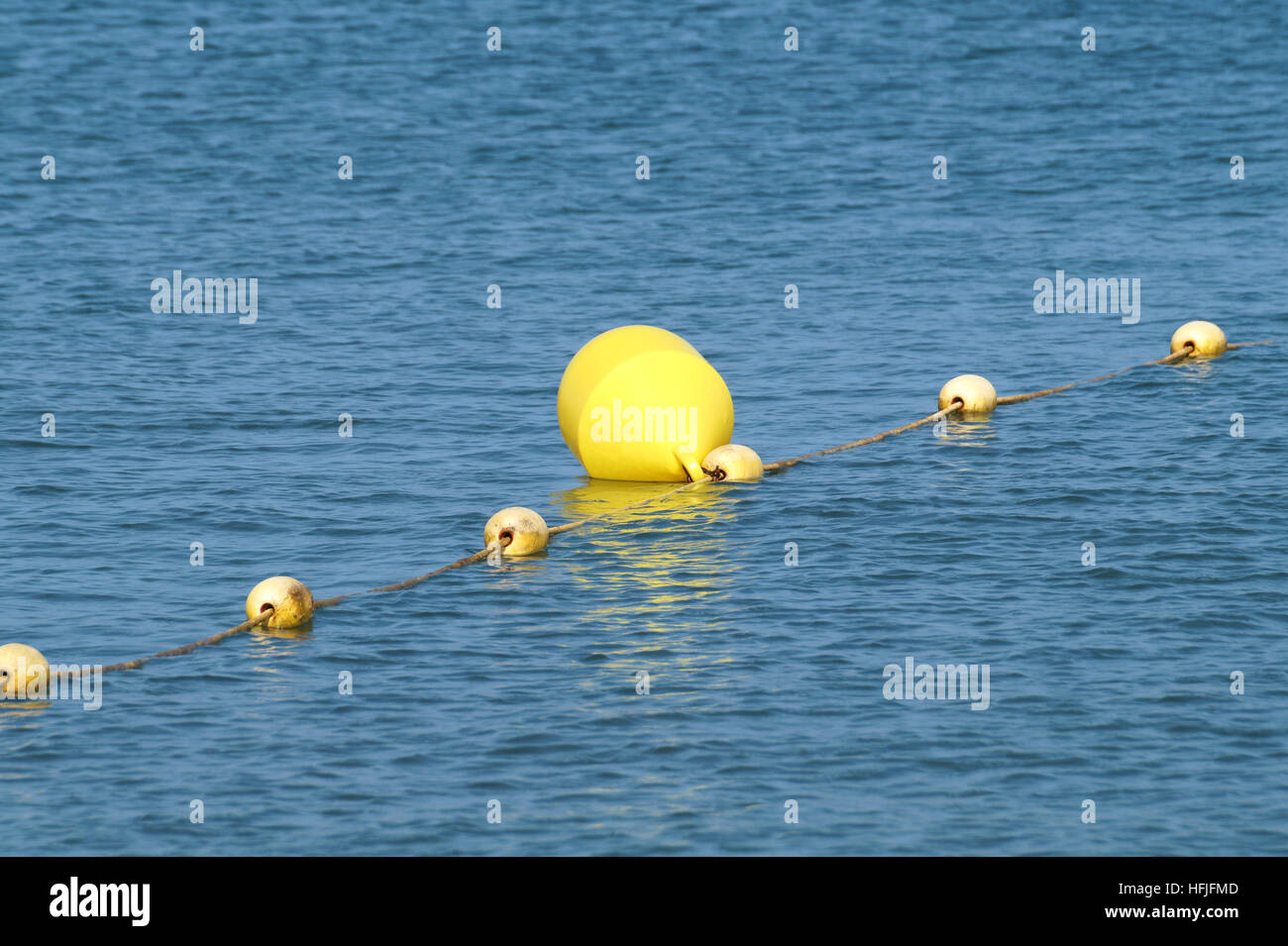 sea bobbing buoy for the safety of maritime Stock Photo - Alamy