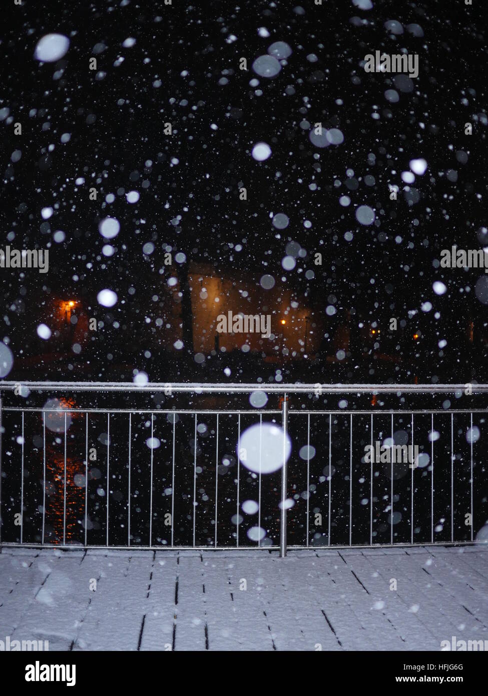 snowfall in the city at night Stock Photo - Alamy