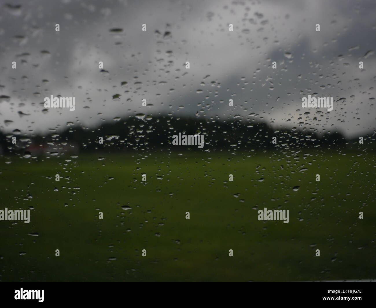 landscape through rainy window Stock Photo - Alamy