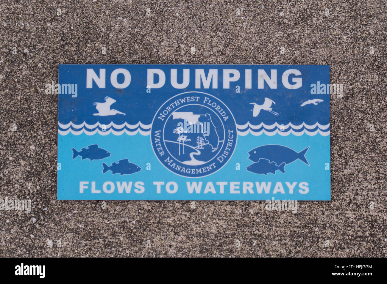 No Dumping Sign in Sidewalk reminds people to protect the local water ...