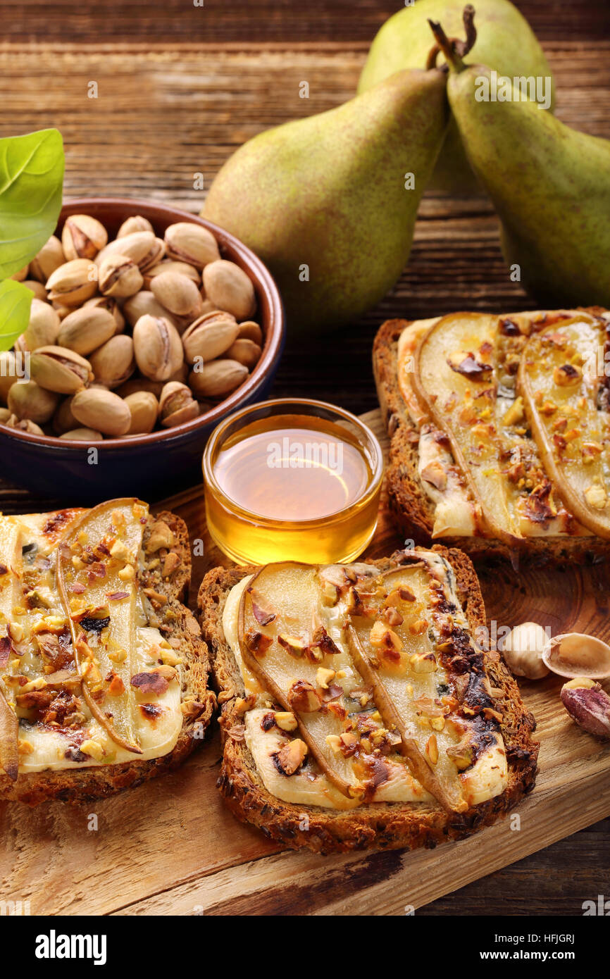 Breakfast crispy toast sandwich with pears blue cheese pistachios and ...