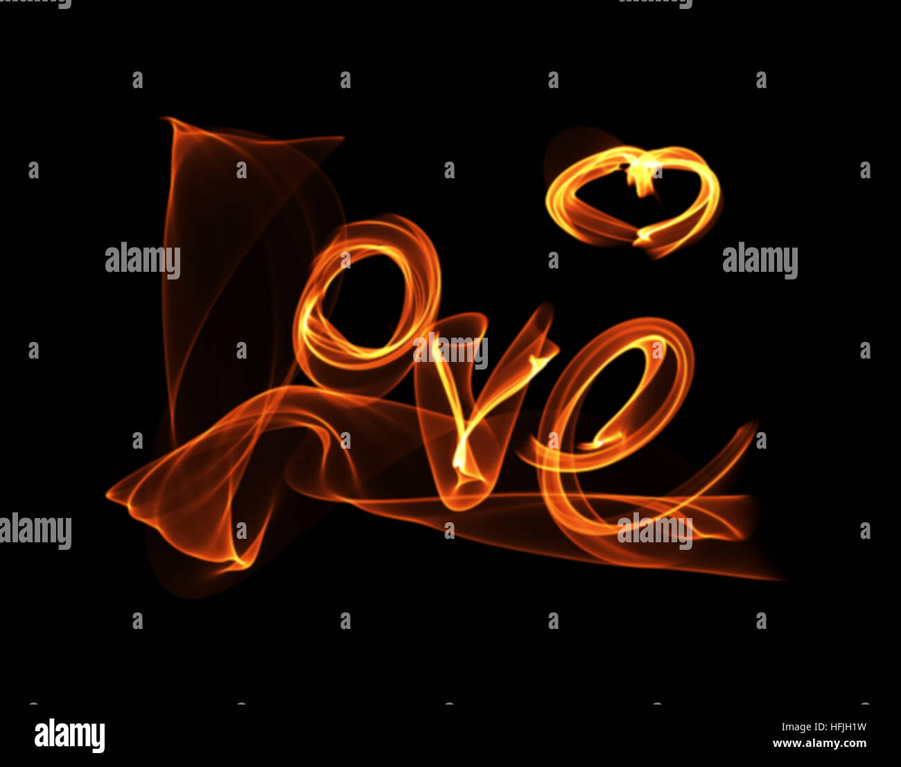 Love isolated word lettering and heart written with fire flame or smoke ...