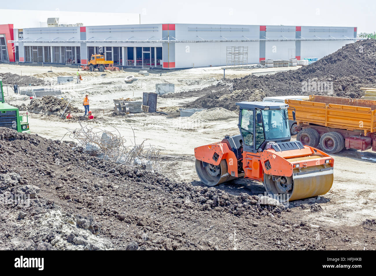 Steamroller is parked at building site. Machinery for road construction ...