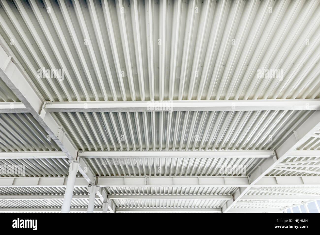 View from below on new ceiling; pillars with steel joints are painted ...