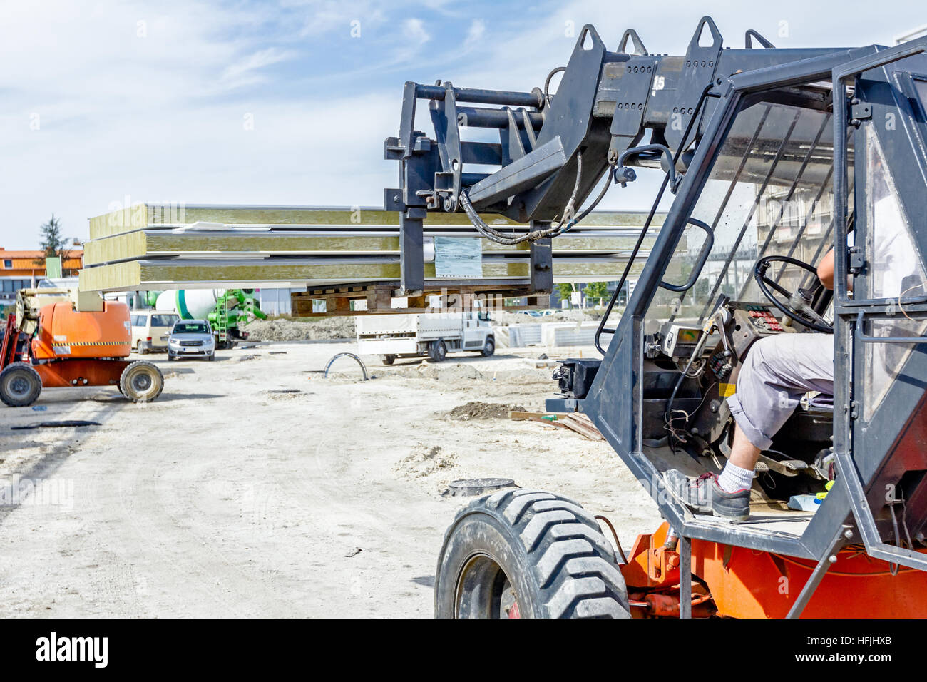 Logistics concept, view on telescopic forklift that is carries ...
