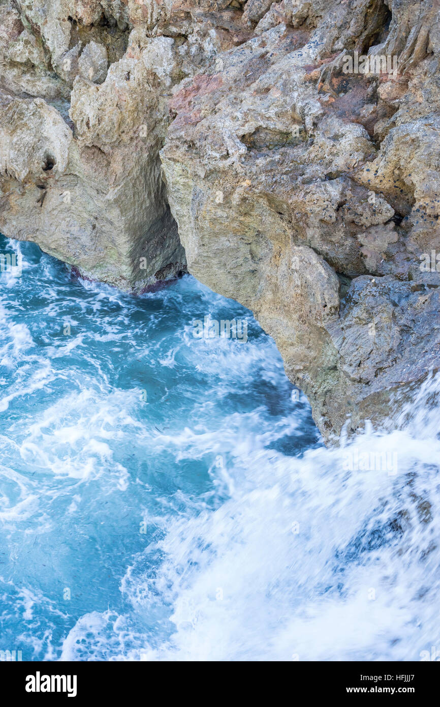 Cliff, Rocks by the sea with waves of the Mediterranean sea next to the ...