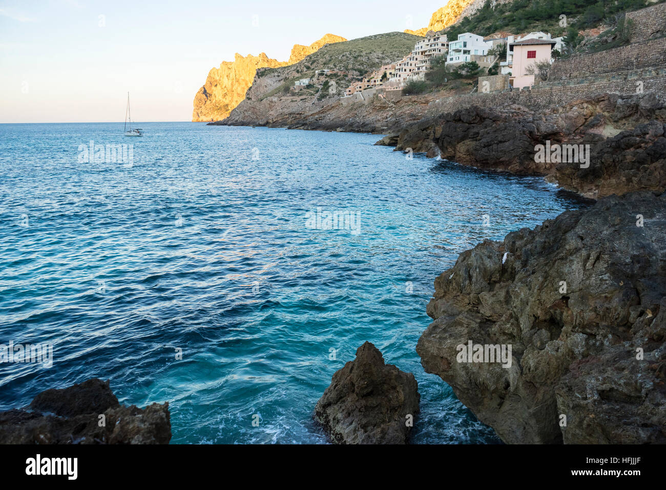 Rocks by the sea with waves of the Mediterranean sea next to the Cabo ...