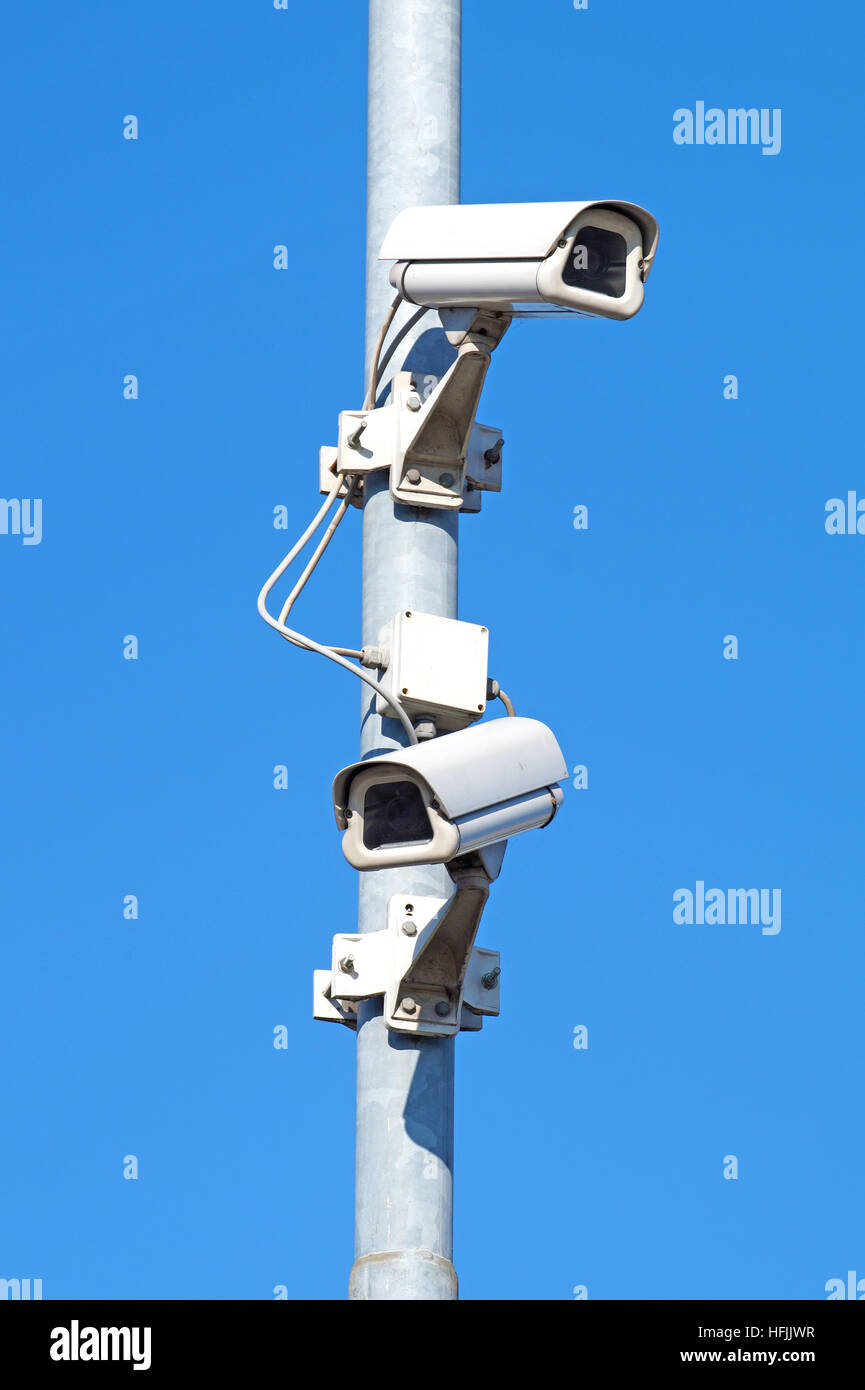 Surveillance cameras against blue sky Security Cctv Stock Photo - Alamy