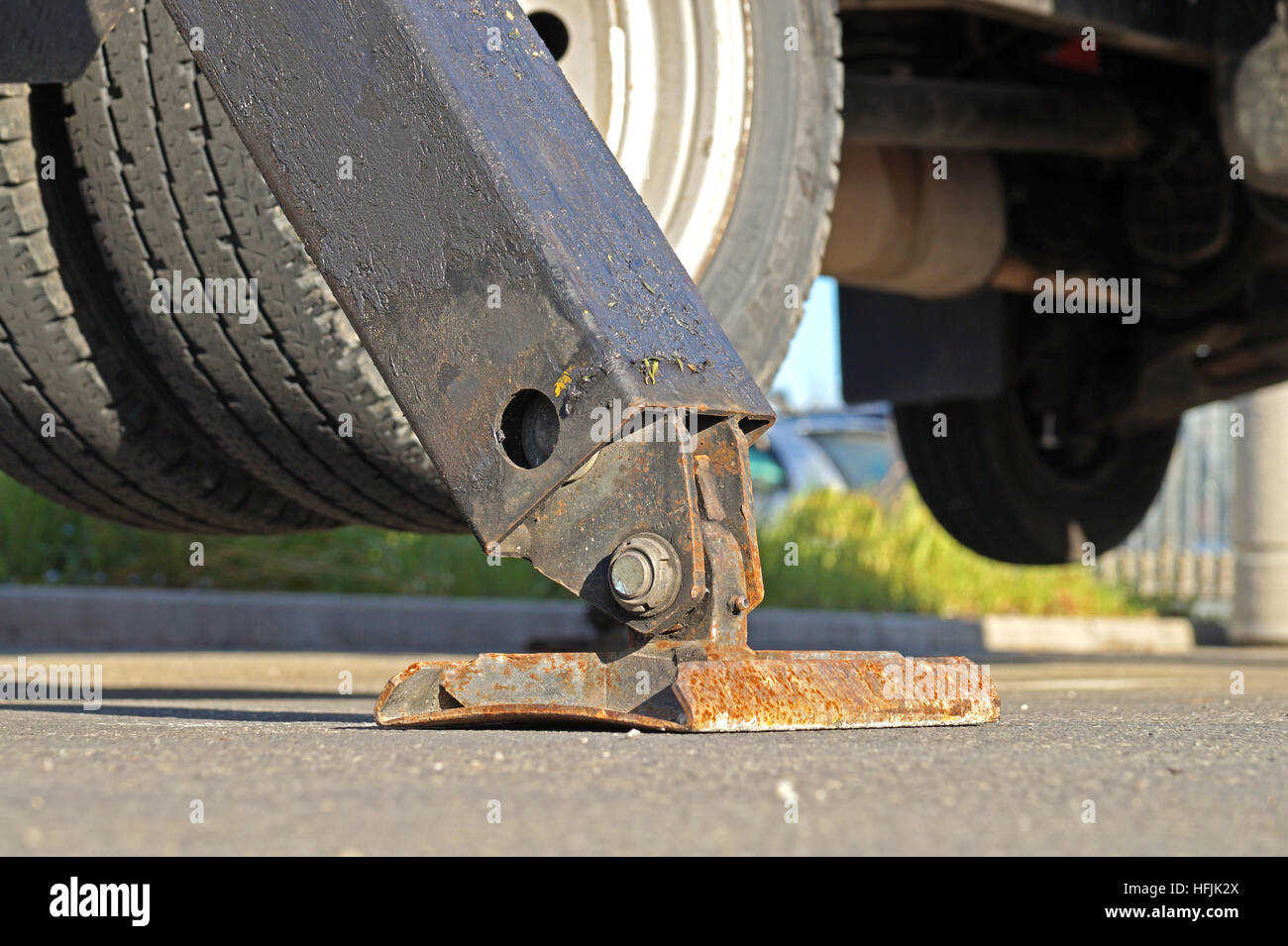 Extended side hydraulic outrigger to increase crane stability until is ...