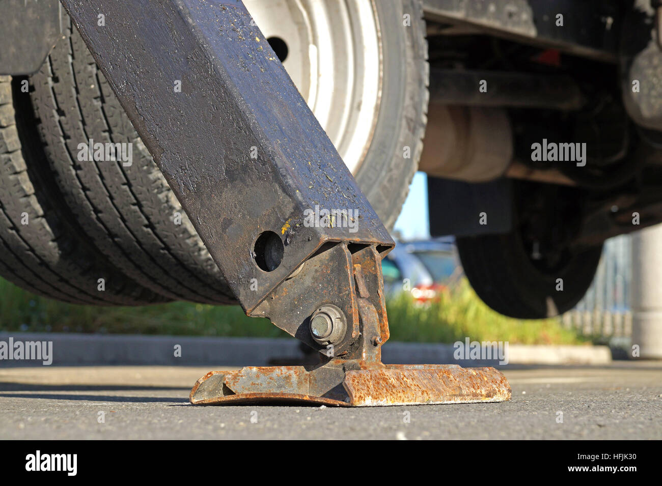 Extended side hydraulic outrigger to increase crane stability until is ...