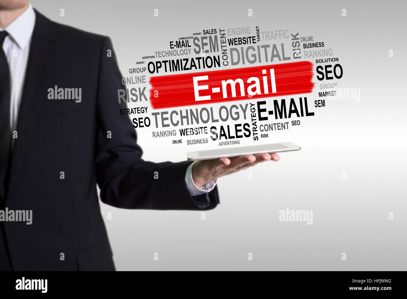 E-mail concept. Man holding a tablet computer Stock Photo - Alamy