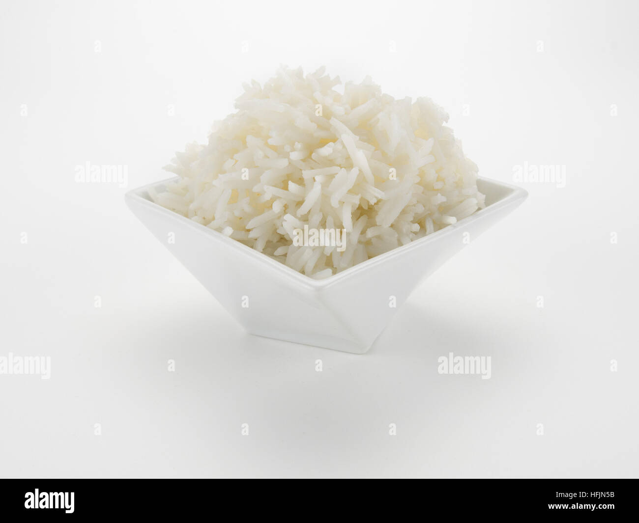 Rice in White Bowl Isolated on White Background Stock Photo - Alamy