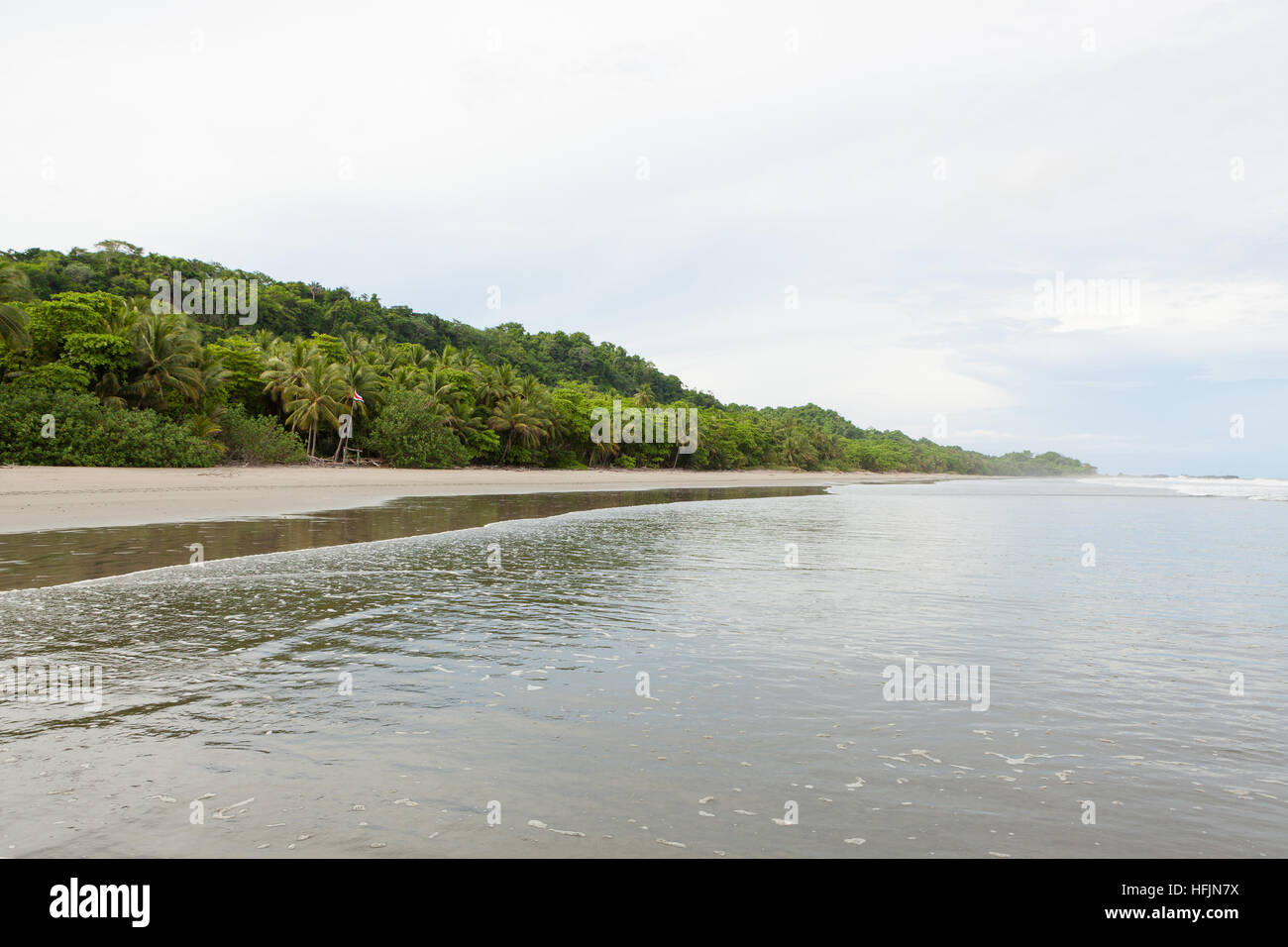 Big open sand beach Montezuma Costa Rica Stock Photo - Alamy