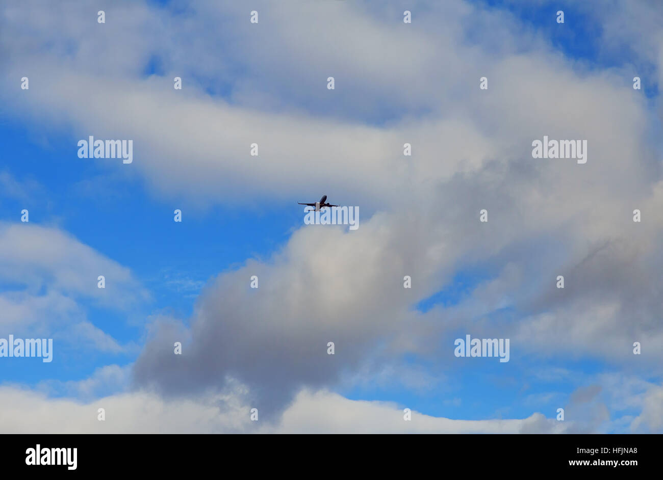 airplane flying through dark stormy clouds aircraft flying through ...