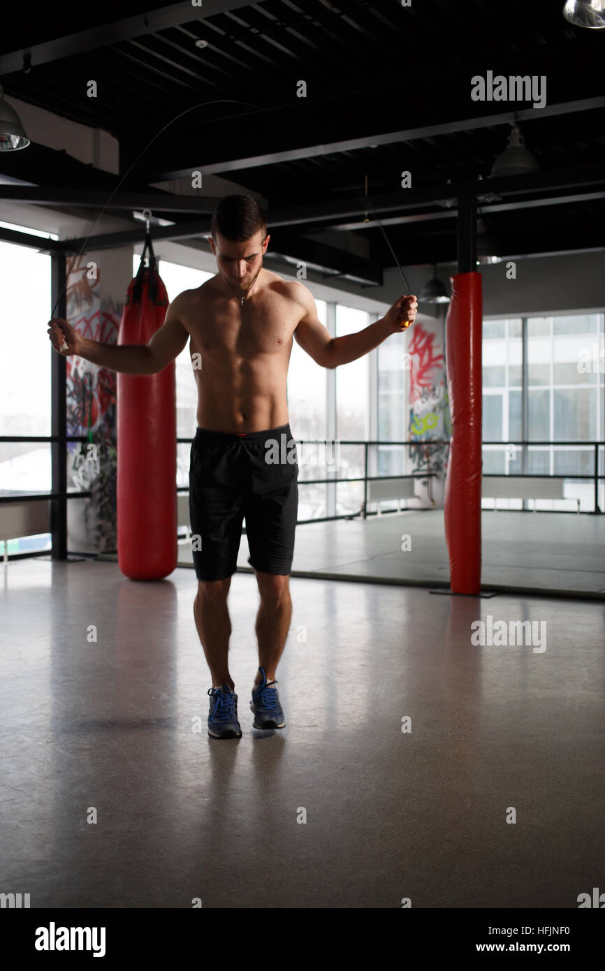 Portrait of man with rope Stock Photo - Alamy